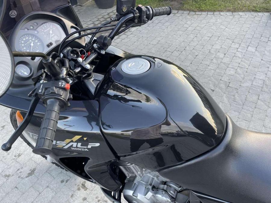 Melns Honda XL 2000 Klaipėda, ar dzinēja tilpumu 0.65 L un nobraukumu 41 tūkst. km par 2900 €, foto 19 vietnē AUTOMOTO.COM.LV