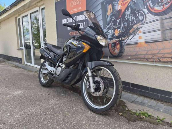 Black Honda XL 2003 in Panevezys, with an engine capacity of 0.65 L and mileage of 31 thousand km for 2150 €, photo 1 on AUTOMOTO.COM.LV