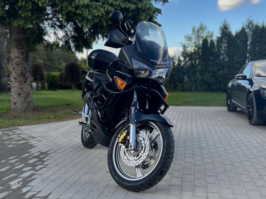Melns Honda XL 2004 Kauņa, ar dzinēja tilpumu 1.00 L un nobraukumu 42 tūkst. km par 3750 €, foto 4 vietnē AUTOMOTO.COM.LV
