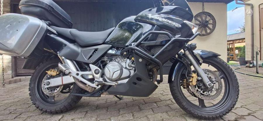Melns Honda XL 2006 Viļņa, ar dzinēja tilpumu 1.00 L un nobraukumu 64 tūkst. km par 3900 €, foto 3 vietnē AUTOMOTO.COM.LV