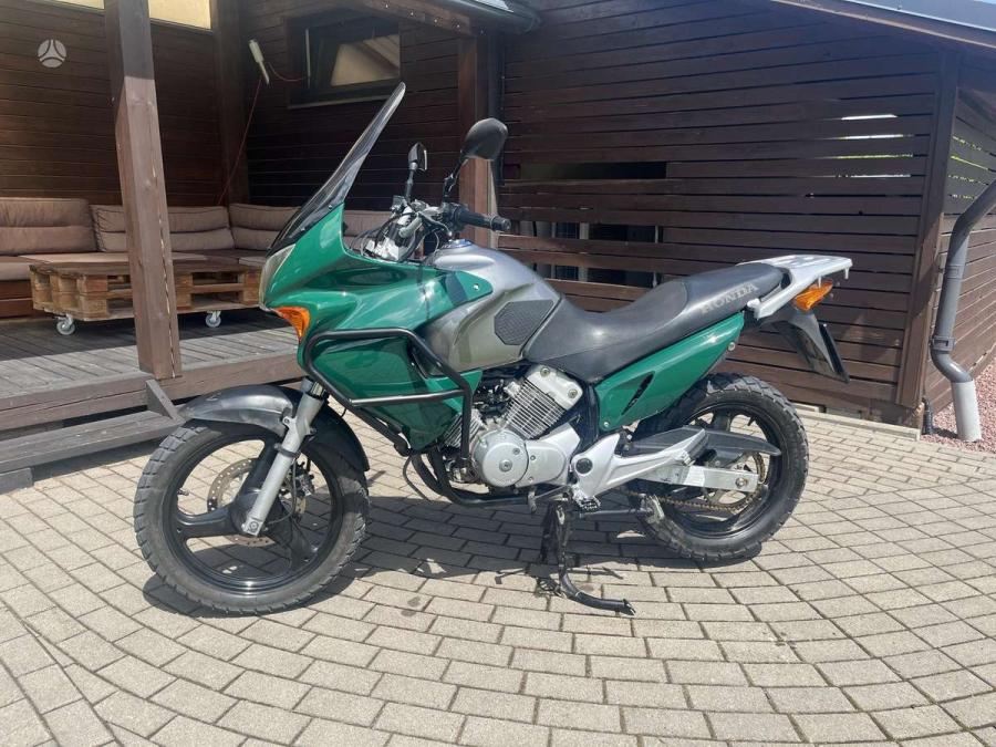 Green Honda XL 2004 in Vilnius, with an engine capacity of 0.13 L and mileage of 64 thousand km for 2500 €, photo 1 on AUTOMOTO.COM.LV