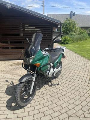Green Honda XL 2004 in Vilnius, with an engine capacity of 0.13 L and mileage of 64 thousand km for 2500 €, photo 3 on AUTOMOTO.COM.LV