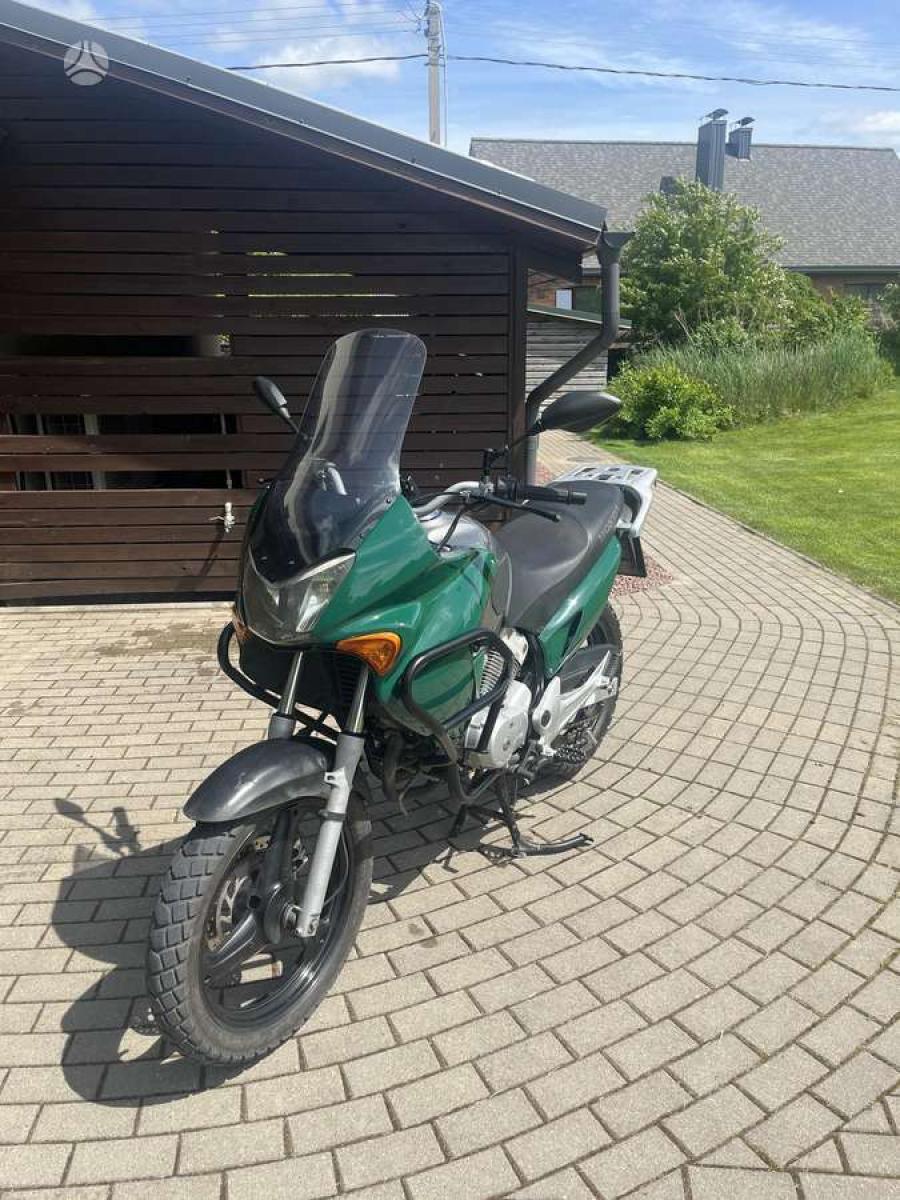 Green Honda XL 2004 in Vilnius, with an engine capacity of 0.13 L and mileage of 64 thousand km for 2500 €, photo 3 on AUTOMOTO.COM.LV