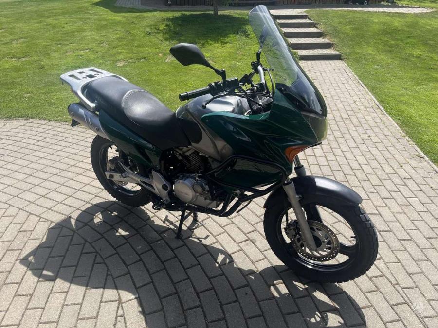 Green Honda XL 2004 in Vilnius, with an engine capacity of 0.13 L and mileage of 64 thousand km for 2500 €, photo 8 on AUTOMOTO.COM.LV