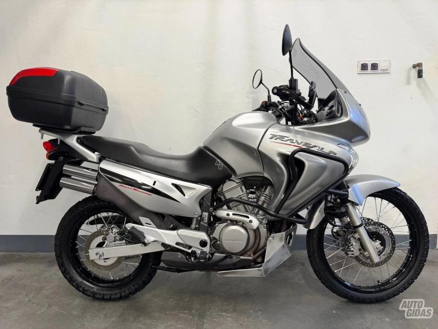 Pelēks Honda XL 2002 Viļņa, ar dzinēja tilpumu 0.65 L un nobraukumu 49 tūkst. km par 3150 €, foto 1 vietnē AUTOMOTO.COM.LV
