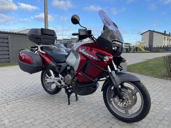 Red Honda XL 2000 in Klaipeda, with an engine capacity of 1.00 L and mileage of 43 thousand km for 2800 €, photo 3 on AUTOMOTO.COM.LV