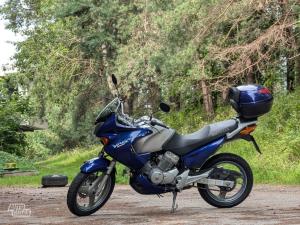 Violet Honda XL 2004 in Vilnius, with an engine capacity of 0.13 L and mileage of 40 thousand km for 2200 €, photo  on AUTOMOTO.COM.LV