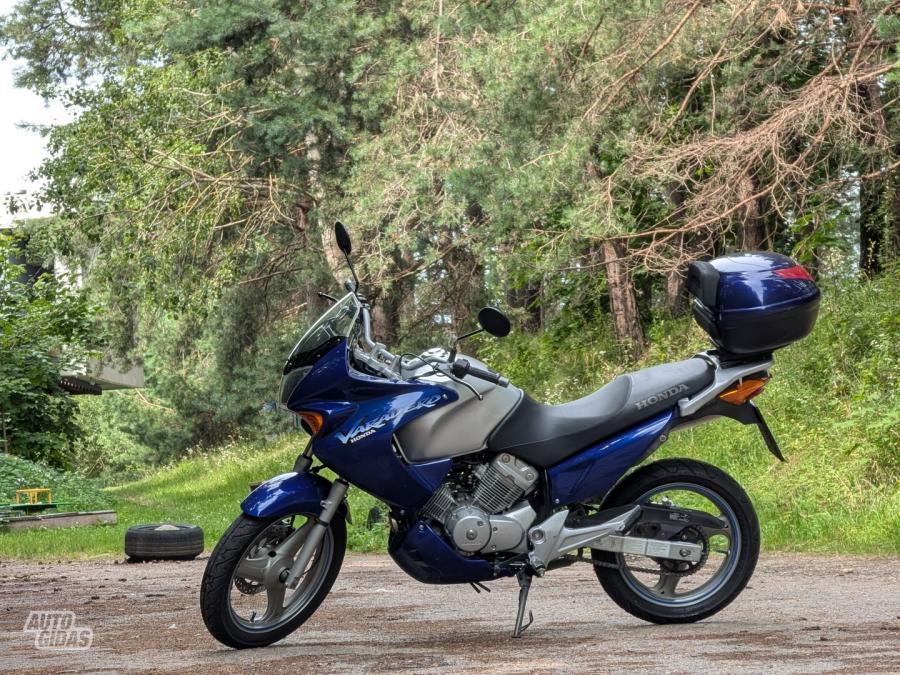 Violet Honda XL 2004 in Vilnius, with an engine capacity of 0.13 L and mileage of 40 thousand km for 2200 €, photo 1 on AUTOMOTO.COM.LV