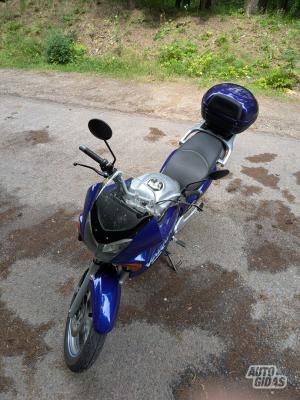 Violet Honda XL 2004 in Vilnius, with an engine capacity of 0.13 L and mileage of 40 thousand km for 2200 €, photo 6 on AUTOMOTO.COM.LV