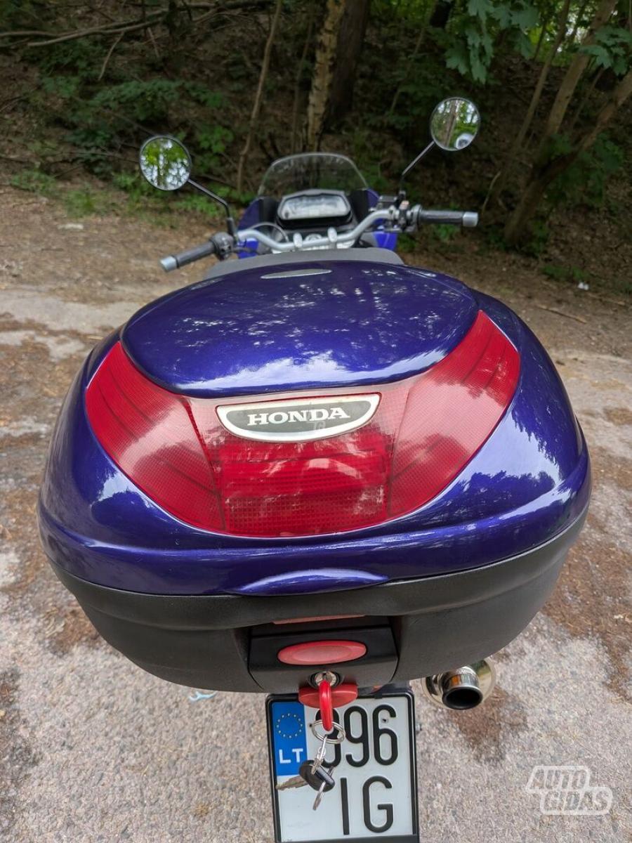 Violet Honda XL 2004 in Vilnius, with an engine capacity of 0.13 L and mileage of 40 thousand km for 2200 €, photo 14 on AUTOMOTO.COM.LV