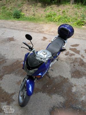 Violet Honda XL 2004 in Vilnius, with an engine capacity of 0.13 L and mileage of 40 thousand km for 1950 €, photo 6 on AUTOMOTO.COM.LV