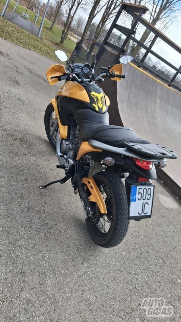 Yellow Honda XL 2008 in Klaipeda, with an engine capacity of 0.70 L and mileage of 101 thousand km for 3000 €, photo 6 on AUTOMOTO.COM.LV