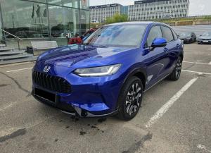 Zils Honda ZR-V 2025 Viļņa, ar dzinēja tilpumu 1.99 L un nobraukumu 28 tūkst. km par 33890 €, foto  vietnē AUTOMOTO.COM.LV