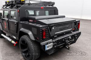 Black Hummer H1 2000 in Tallinn, with an engine capacity of 6.50 L and mileage of 61 thousand km for 110000 €, photo 14 on AUTOMOTO.COM.LV