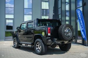 Black Hummer H2 2008 in Kaunas, with an engine capacity of 6.20 L and mileage of 114 thousand km for 54950 €, photo 9 on AUTOMOTO.COM.LV