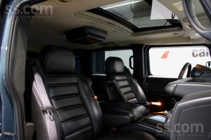 Blue Hummer H2 2004 in Riga, with an engine capacity of 6.00 L and mileage of 163 thousand km for 25000 €, photo 22 on AUTOMOTO.COM.LV