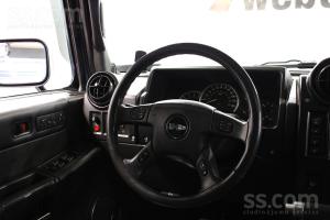 Blue Hummer H2 2004 in Riga, with an engine capacity of 6.00 L and mileage of 163 thousand km for 25000 €, photo 27 on AUTOMOTO.COM.LV