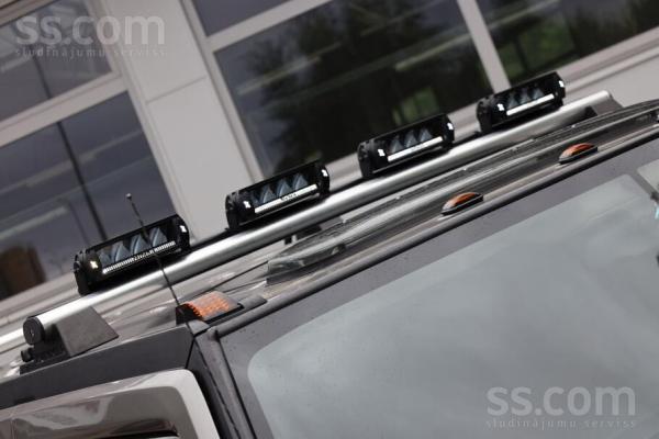 Brown Hummer H2 2010 in Riga, with an engine capacity of 6.20 L and mileage of 0 thousand km for 29995 €, photo 6 on AUTOMOTO.COM.LV