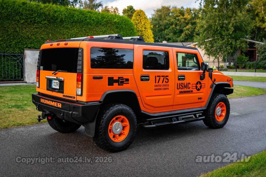 Oranžs Hummer H2 2003 Tallina, ar dzinēja tilpumu 6.00 L un nobraukumu 299 tūkst. km par 18900 €, foto 12 vietnē AUTOMOTO.COM.LV
