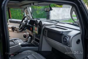 Oranžs Hummer H2 2003 Tallina, ar dzinēja tilpumu 6.00 L un nobraukumu 299 tūkst. km par 18900 €, foto 45 vietnē AUTOMOTO.COM.LV