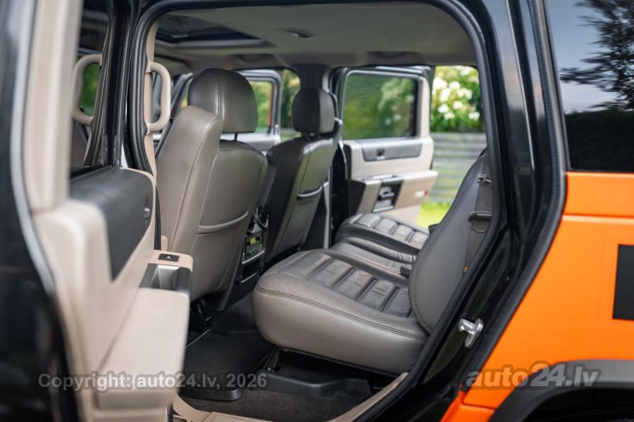Oranžs Hummer H2 2003 Tallina, ar dzinēja tilpumu 6.00 L un nobraukumu 299 tūkst. km par 18900 €, foto 44 vietnē AUTOMOTO.COM.LV