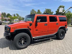 Orange Hummer H2 2008 in Alytus, with an engine capacity of 6.20 L and mileage of 288 thousand km for 49500 €, photo  on AUTOMOTO.COM.LV