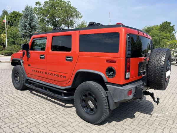 Orange Hummer H2 2008 in Alytus, with an engine capacity of 6.20 L and mileage of 288 thousand km for 49500 €, photo 2 on AUTOMOTO.COM.LV