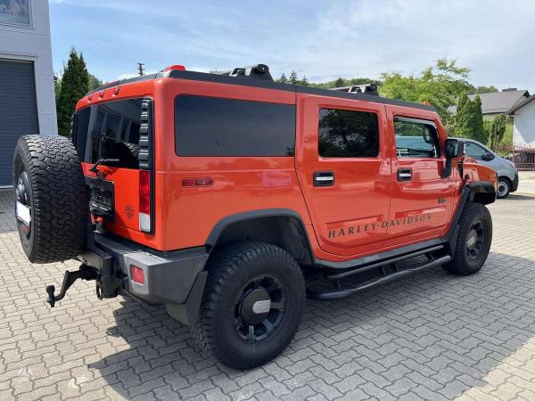 Orange Hummer H2 2008 in Alytus, with an engine capacity of 6.20 L and mileage of 288 thousand km for 49500 €, photo 4 on AUTOMOTO.COM.LV