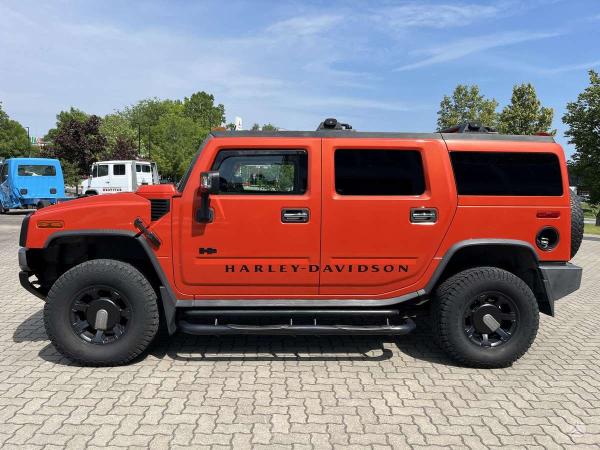 Orange Hummer H2 2008 in Alytus, with an engine capacity of 6.20 L and mileage of 288 thousand km for 49500 €, photo 5 on AUTOMOTO.COM.LV