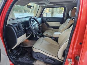Orange Hummer H3 2008 in Siauliai, with an engine capacity of 5.33 L and mileage of 335 thousand km for 17999 €, photo 8 on AUTOMOTO.COM.LV