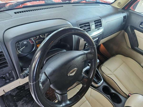 Orange Hummer H3 2008 in Siauliai, with an engine capacity of 5.33 L and mileage of 335 thousand km for 17999 €, photo 11 on AUTOMOTO.COM.LV