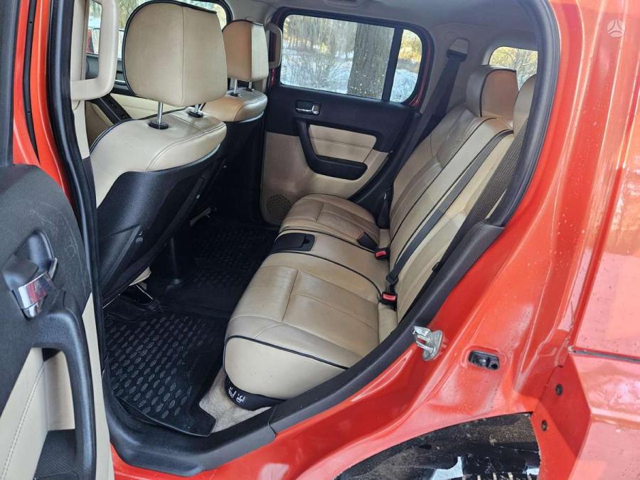 Orange Hummer H3 2008 in Siauliai, with an engine capacity of 5.33 L and mileage of 335 thousand km for 17999 €, photo 12 on AUTOMOTO.COM.LV