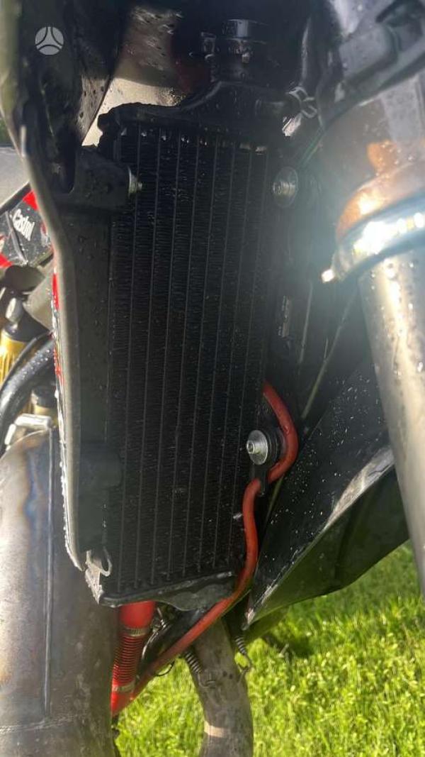 Red Husqvarna SM 2006 in Utena, with an engine capacity of 0.13 L and mileage of 1 thousand km for 2950 €, photo 3 on AUTOMOTO.COM.LV