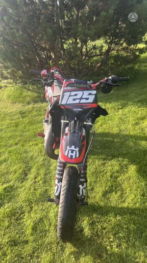 Red Husqvarna SM 2006 in Utena, with an engine capacity of 0.13 L and mileage of 1 thousand km for 2950 €, photo 14 on AUTOMOTO.COM.LV