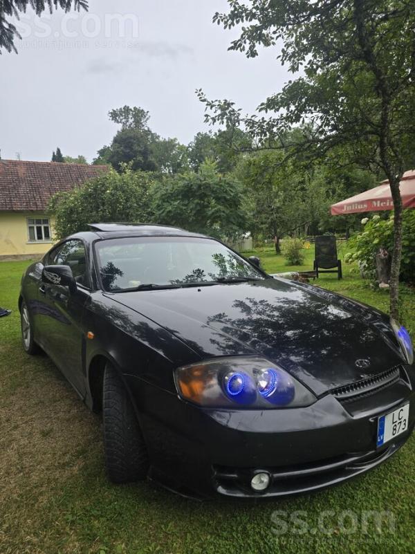 Melns Hyundai Coupe 2004 Valmiera, ar dzinēja tilpumu 2.00 L un nobraukumu 244 tūkst. km par 1400 €, foto 1 vietnē AUTOMOTO.COM.LV