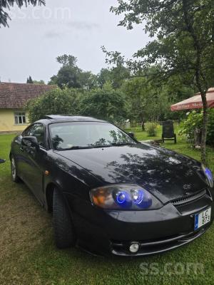 Black Hyundai Coupe 2004 in Valmiera, with an engine capacity of 2.00 L and mileage of 244 thousand km for 1400 €, photo  on AUTOMOTO.COM.LV
