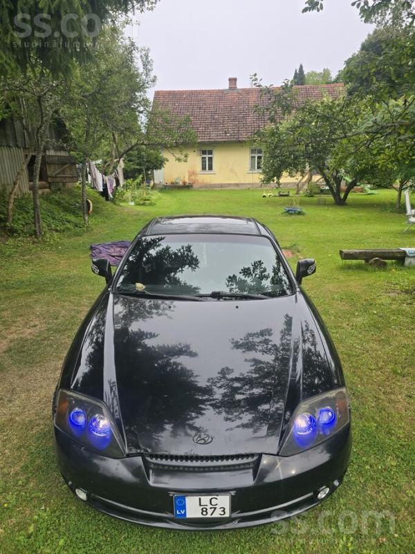 Melns Hyundai Coupe 2004 Valmiera, ar dzinēja tilpumu 2.00 L un nobraukumu 244 tūkst. km par 1400 €, foto 3 vietnē AUTOMOTO.COM.LV