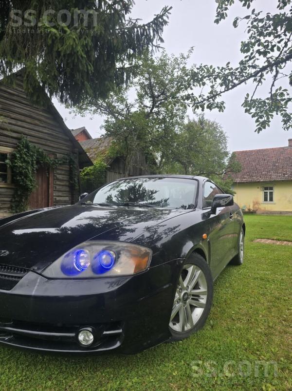 Melns Hyundai Coupe 2004 Valmiera, ar dzinēja tilpumu 2.00 L un nobraukumu 244 tūkst. km par 1400 €, foto 4 vietnē AUTOMOTO.COM.LV