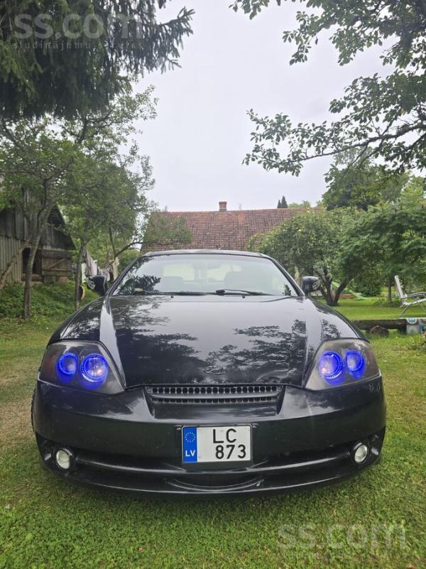 Melns Hyundai Coupe 2004 Valmiera, ar dzinēja tilpumu 2.00 L un nobraukumu 244 tūkst. km par 1400 €, foto 5 vietnē AUTOMOTO.COM.LV