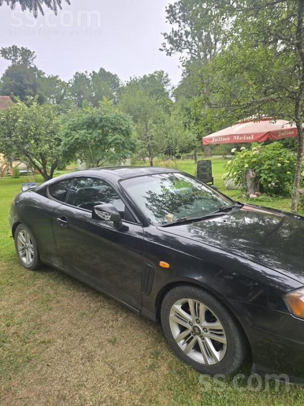 Melns Hyundai Coupe 2004 Valmiera, ar dzinēja tilpumu 2.00 L un nobraukumu 244 tūkst. km par 1400 €, foto 6 vietnē AUTOMOTO.COM.LV