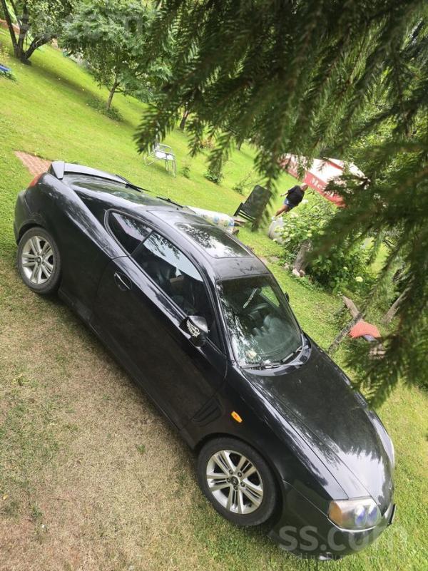 Melns Hyundai Coupe 2004 Valmiera, ar dzinēja tilpumu 2.00 L un nobraukumu 244 tūkst. km par 1400 €, foto 7 vietnē AUTOMOTO.COM.LV