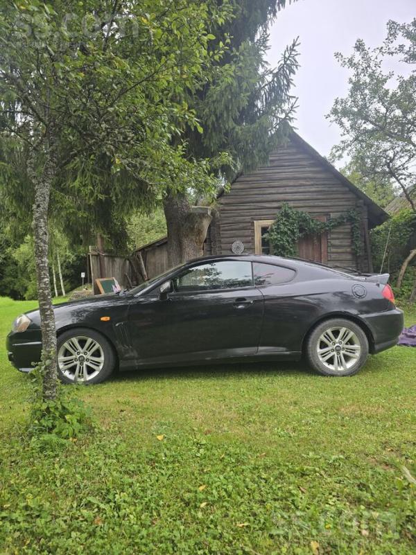 Melns Hyundai Coupe 2004 Valmiera, ar dzinēja tilpumu 2.00 L un nobraukumu 244 tūkst. km par 1400 €, foto 8 vietnē AUTOMOTO.COM.LV