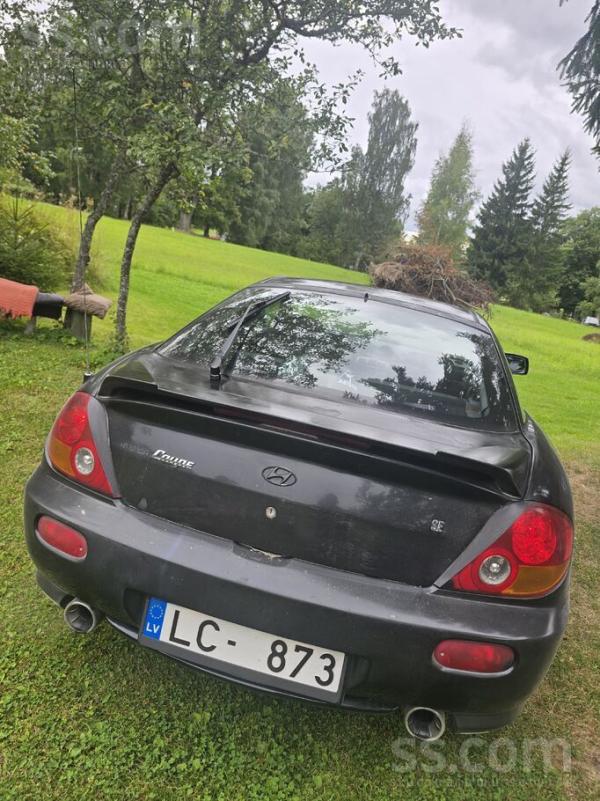 Melns Hyundai Coupe 2004 Valmiera, ar dzinēja tilpumu 2.00 L un nobraukumu 244 tūkst. km par 1400 €, foto 9 vietnē AUTOMOTO.COM.LV