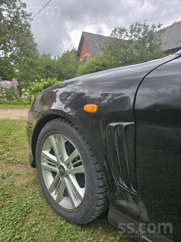 Melns Hyundai Coupe 2004 Valmiera, ar dzinēja tilpumu 2.00 L un nobraukumu 244 tūkst. km par 1400 €, foto 10 vietnē AUTOMOTO.COM.LV