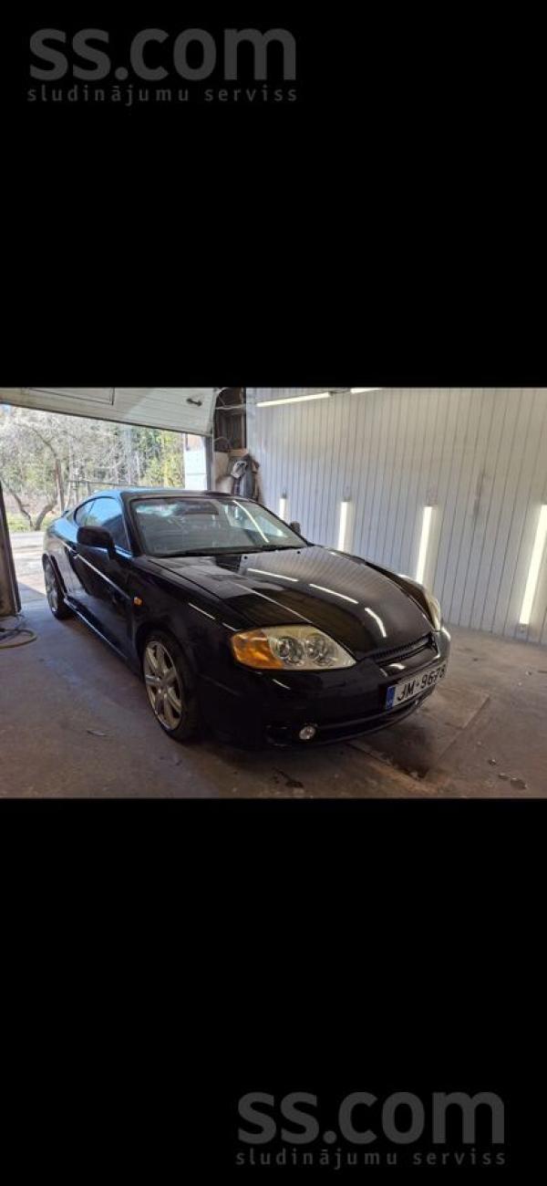 Melns Hyundai Coupe 2005 Rīga, ar dzinēja tilpumu 2.00 L un nobraukumu 216 tūkst. km par 1900 €, foto 2 vietnē AUTOMOTO.COM.LV