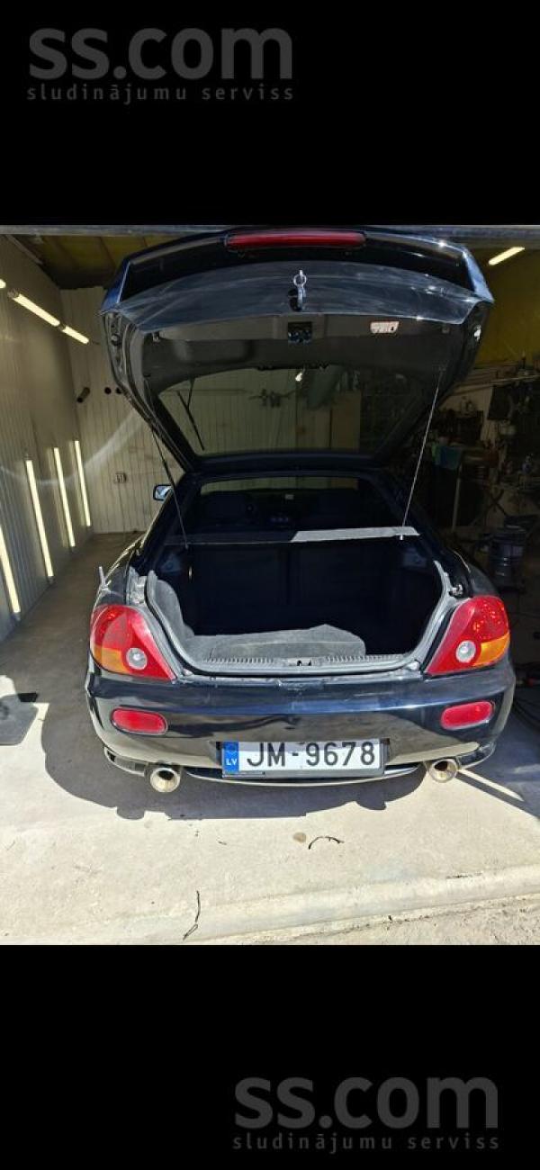 Melns Hyundai Coupe 2005 Rīga, ar dzinēja tilpumu 2.00 L un nobraukumu 216 tūkst. km par 1900 €, foto 5 vietnē AUTOMOTO.COM.LV