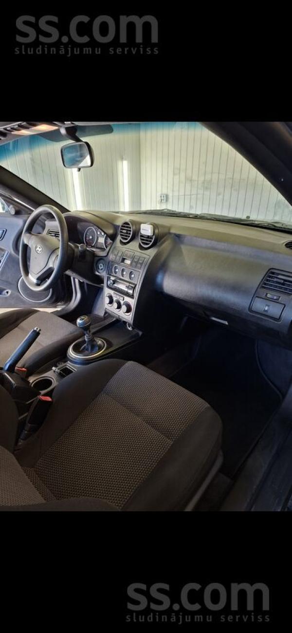 Melns Hyundai Coupe 2005 Rīga, ar dzinēja tilpumu 2.00 L un nobraukumu 216 tūkst. km par 1900 €, foto 6 vietnē AUTOMOTO.COM.LV