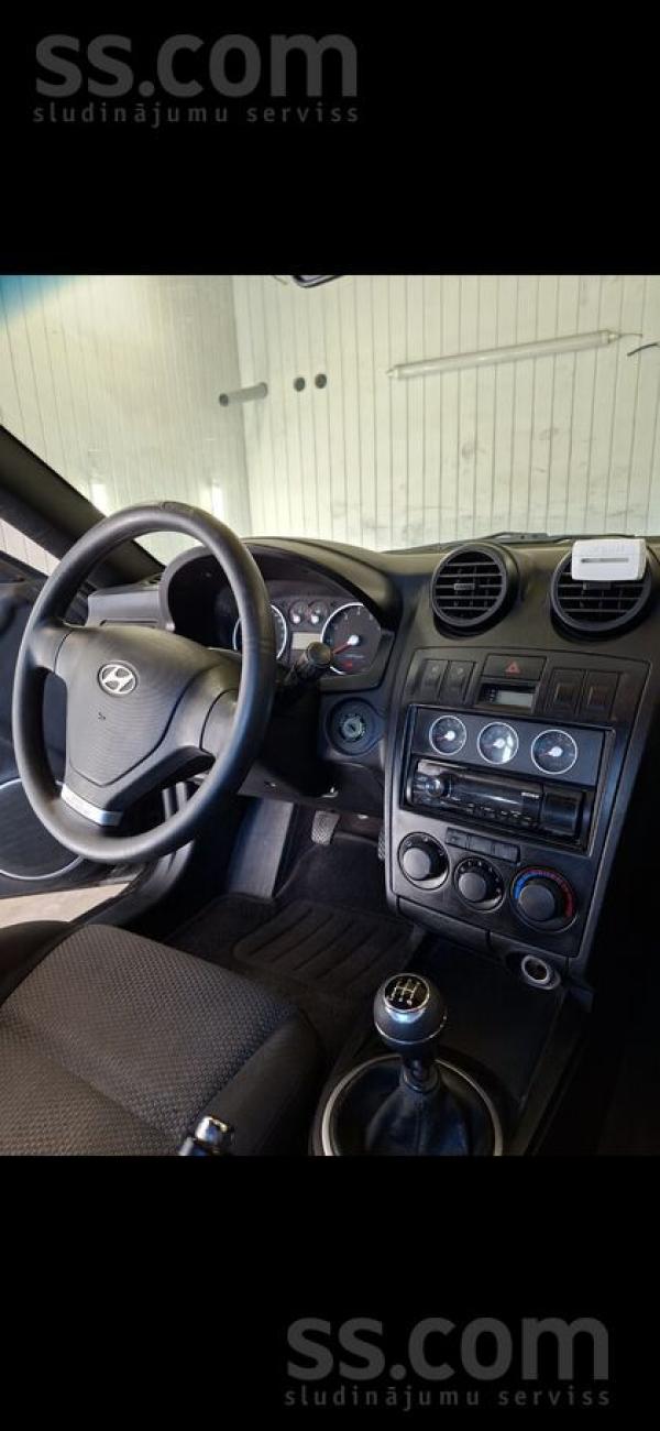 Melns Hyundai Coupe 2005 Rīga, ar dzinēja tilpumu 2.00 L un nobraukumu 216 tūkst. km par 1900 €, foto 7 vietnē AUTOMOTO.COM.LV