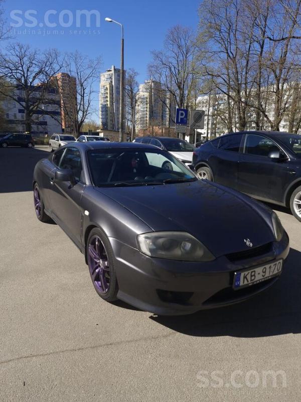 Black Hyundai Coupe 2006 in Riga, with an engine capacity of 2.00 L and mileage of 185 thousand km for 950 €, photo 1 on AUTOMOTO.COM.LV