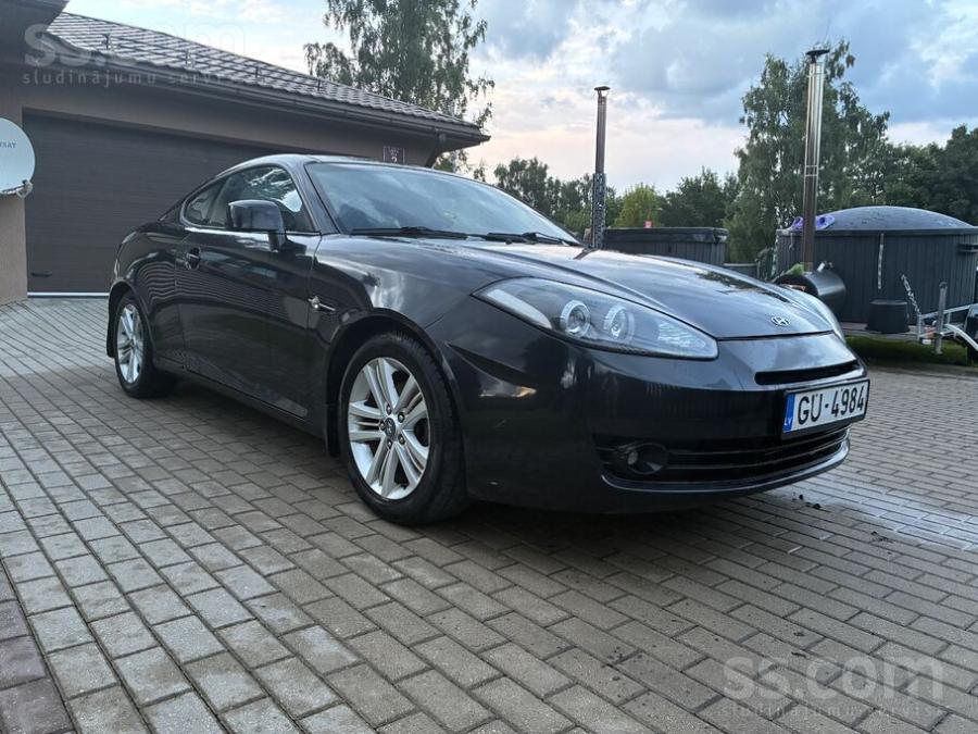 Melns Hyundai Coupe 2007 Rīga, ar dzinēja tilpumu 2.00 L un nobraukumu 204 tūkst. km par 3200 €, foto 1 vietnē AUTOMOTO.COM.LV